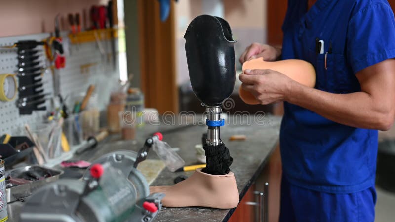 Technician Assembling Prosthetic Leg in Workshop Setting Stock Video ...
