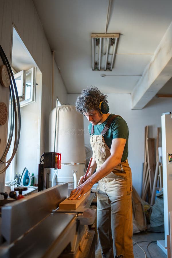 Skilled Woodworker Operate Jointer Machine, Process Wooden Beam with ...