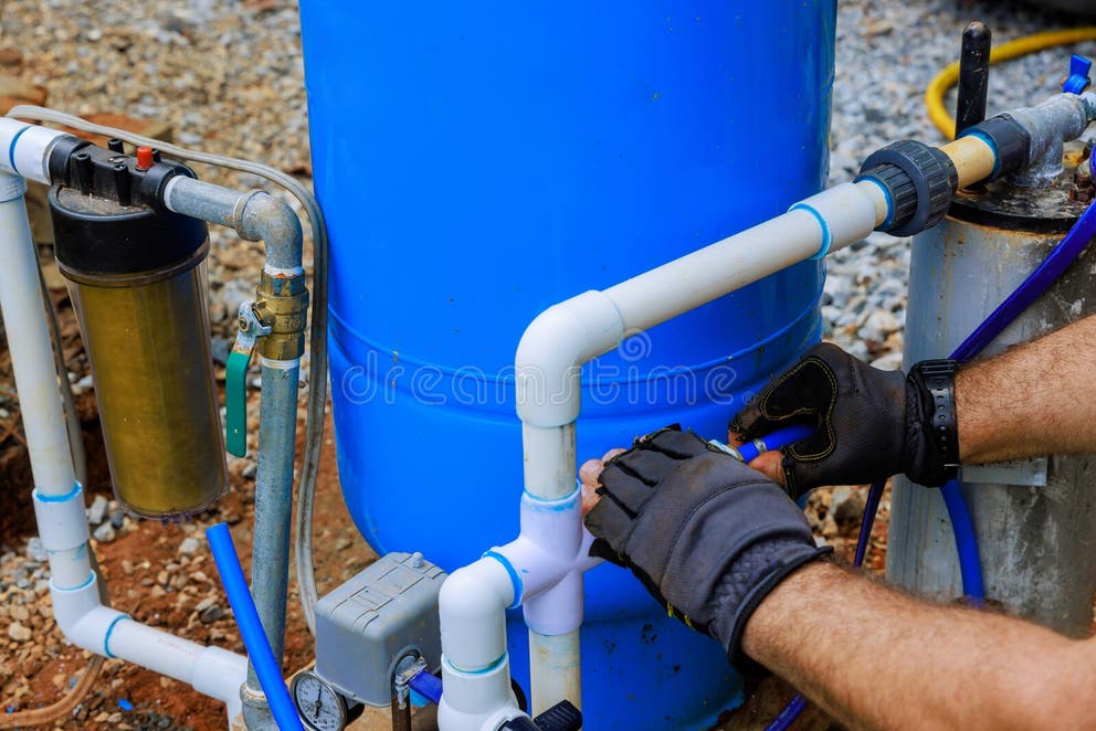 Plumber Fixes Artesian Water Well System at Construction Site during ...