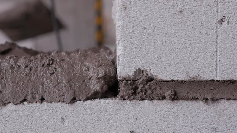 Bricklaying on the site stock video. Video of form, attention - 367132539