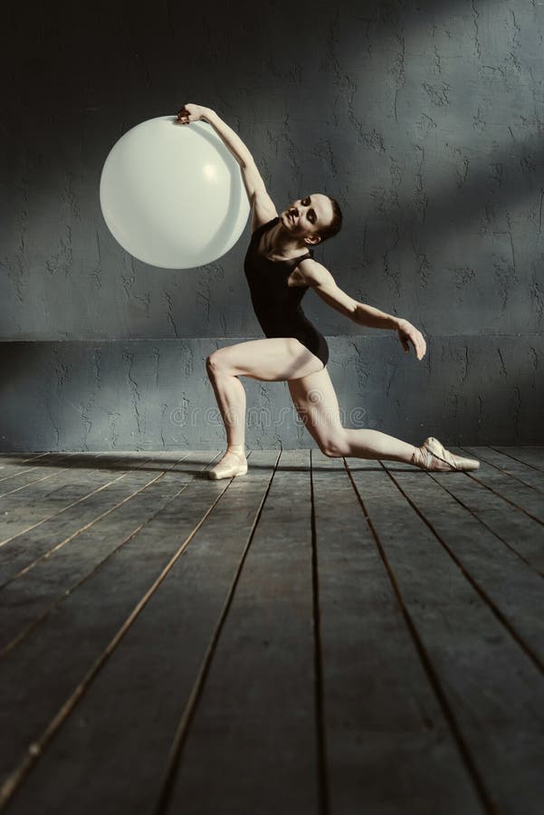 Skilled Young Gymnast Performing Using the White Balloon Stock Image ...