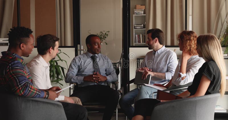 Happy Motivated Colleagues Shaking Hands, Making Agreement at Meeting ...