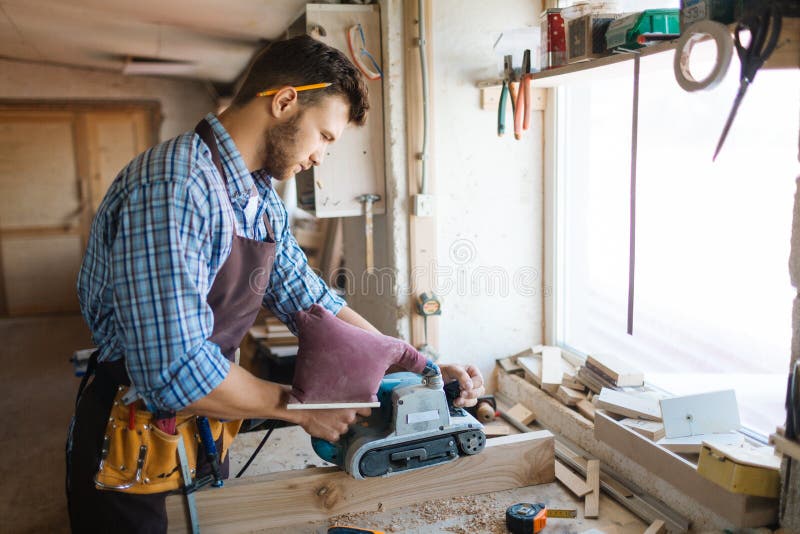 Skillful Carpenter Working with Electric Sander Stock Image - Image of ...