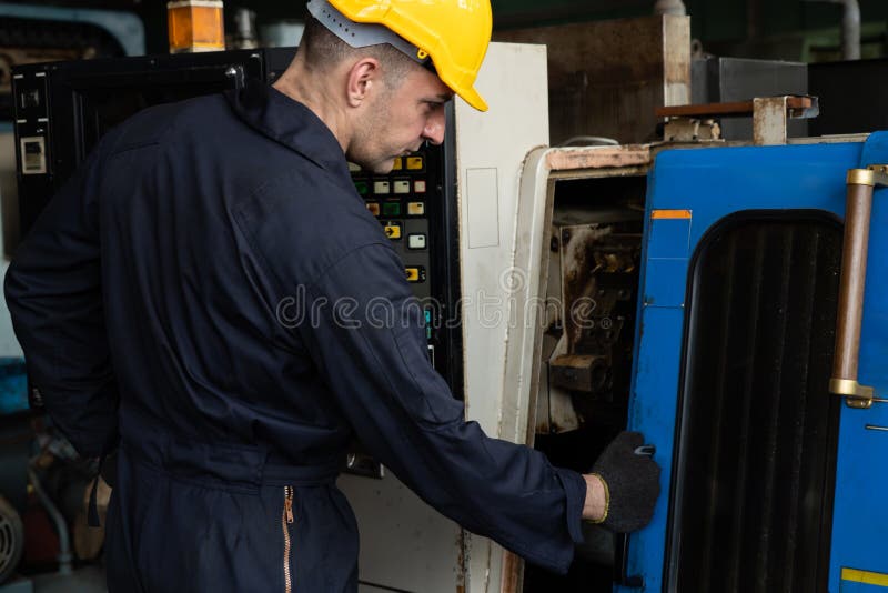 Skillful Factory Worker Working with Clipboard To Do Job Procedure ...