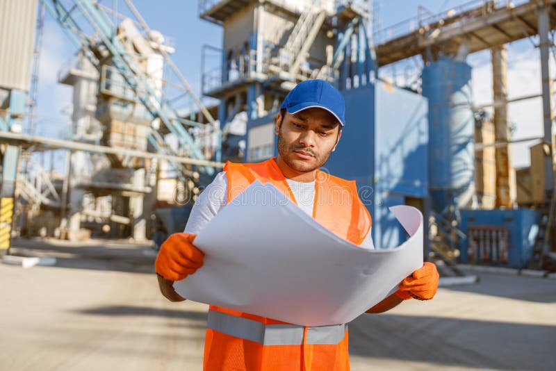 Skillful Multiethnic Engineer Working at Construction Industry ...