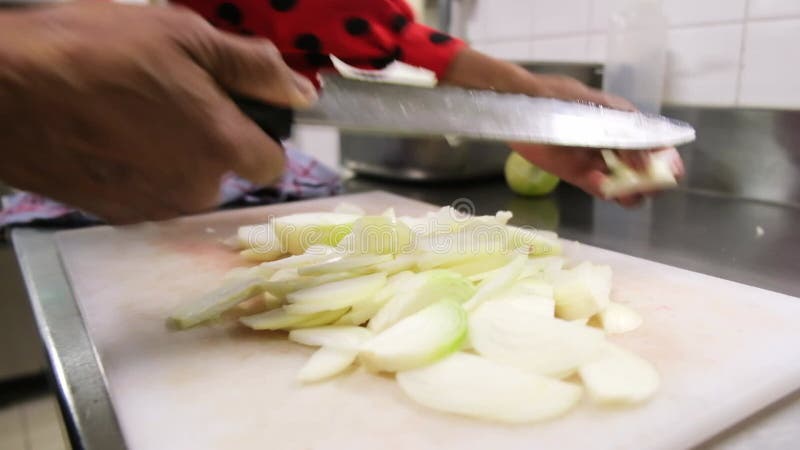Skillful Onion Chopping in a Busy Kitchen Setting with Expert Knife ...