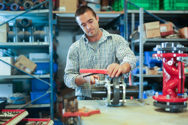 Worker Fixing Pipe Fitting in Repair Service Stock Image - Image of ...