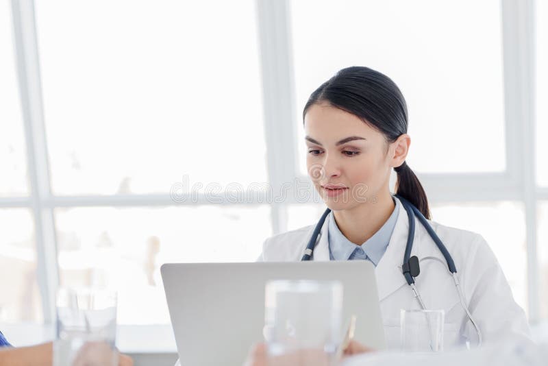 Skillful Young Physician Working on Computer Stock Photo - Image of ...