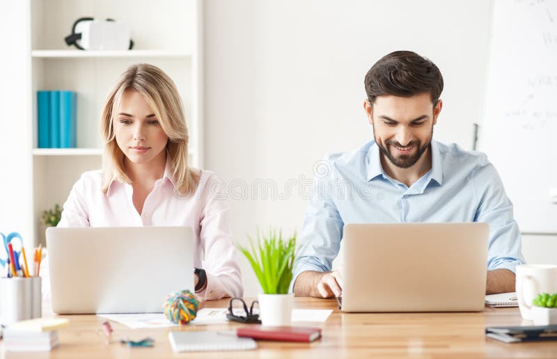 Skillful Young Workers are Using Their Computers Stock Photo - Image of ...