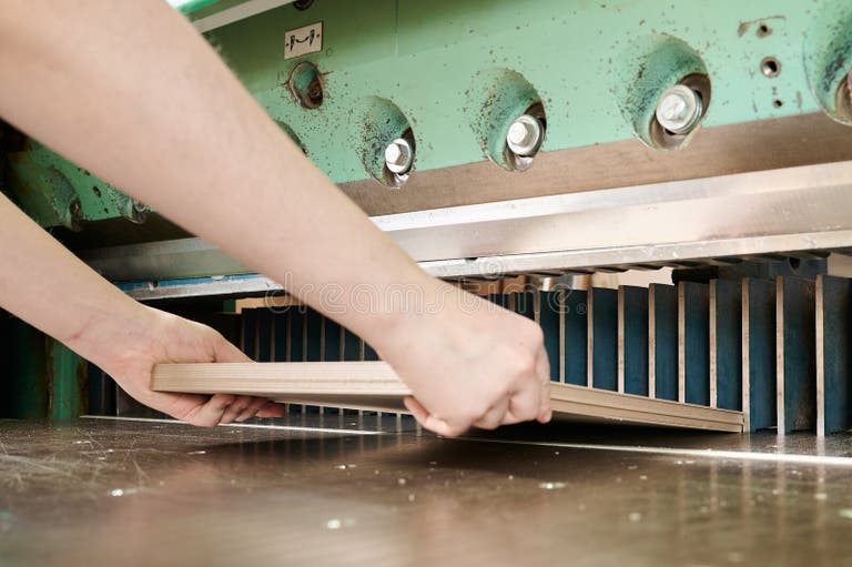 Precision Cutting of Cardboard Sheets with Guillotine Shears in a ...