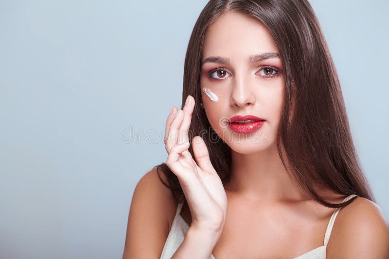 Beauty Skin Care Beautiful Woman Applying Cosmetic Face Cream Stock