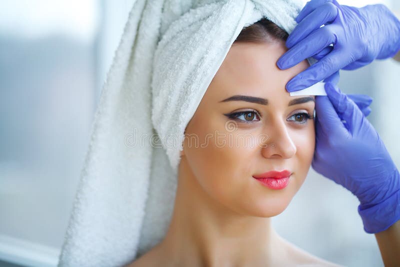 Skin Care. Experienced Cosmetician Pulling Out Brows Stock Photo ...