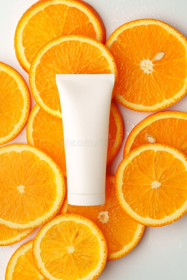 Skincare Cosmetic Containers on Stacked Orange Slices Stock Photo ...