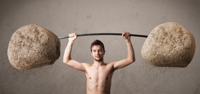 Skinny Guy Lifting Large Rock Stone Weights Stock Image - Image of ...