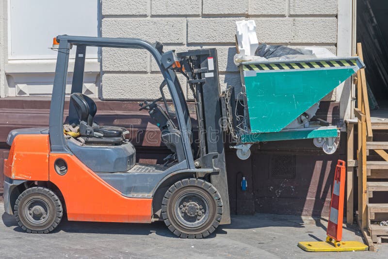 Skip and Truck stock photo. Image of plant, ramp, dumpster - 126637952