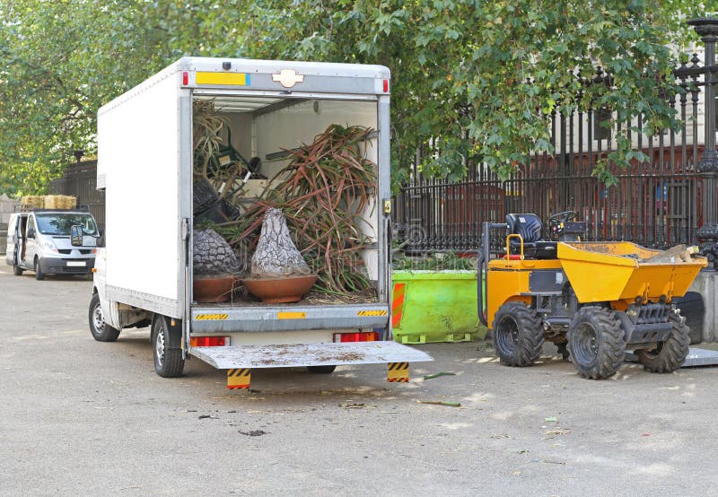 Skip and Truck stock photo. Image of plant, ramp, dumpster - 126637952