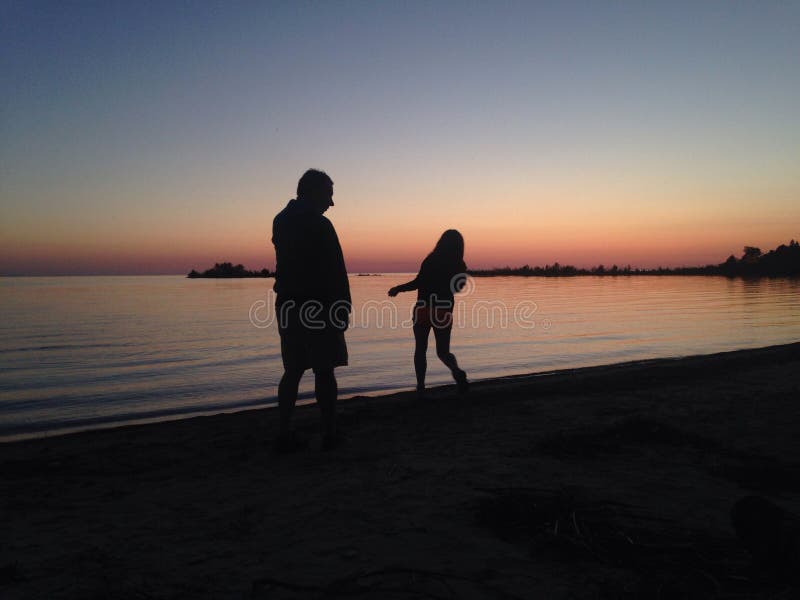 Skipping Rocks stock image. Image of lakes, rocks, sunset - 74162805