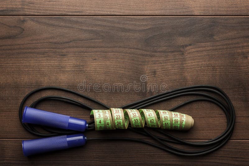 Skipping Rope and Measuring Tape Stock Photo - Image of jump, black ...