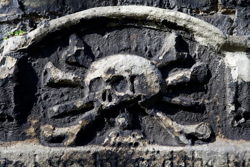 Skull & Crossbones Carving on a Gravestone Stock Photo - Image of death ...