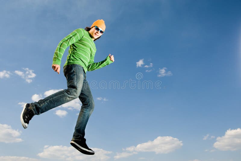 Man Jumping Over Wall stock image. Image of handsome - 20354579