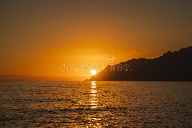 Sky Ablaze with the Fire of the Setting Sun Along Amalfi Coast Stock ...