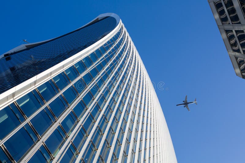 Sky, Airplane and Office Building Stock Image - Image of silhouette ...