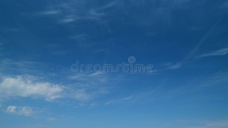 Sky Background Cloudscape. Thin Cirrus Clouds in Blue Sky. Movement of ...