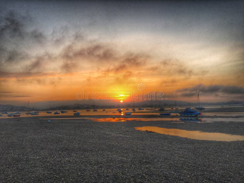 Sunset in south stock image. Image of sunset, water - 141040237