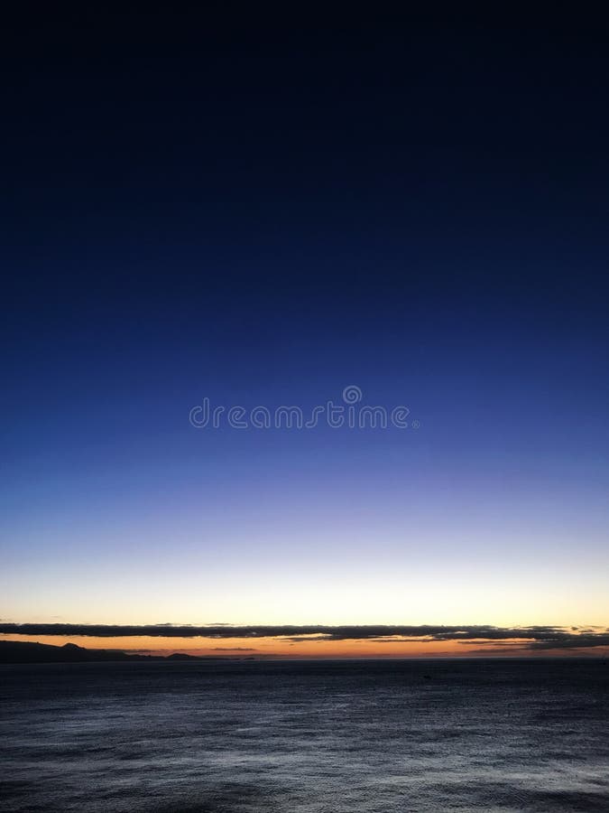 Sky stock photo. Image of ocean, blue, yellow, sunset - 264136070