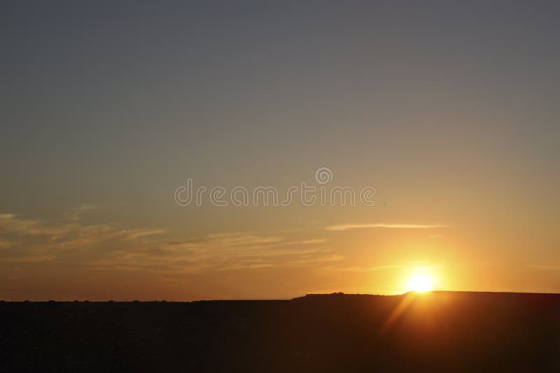 Sky with a Black Mountain Silhouette. Play of Light and Shadow. Sun Set ...