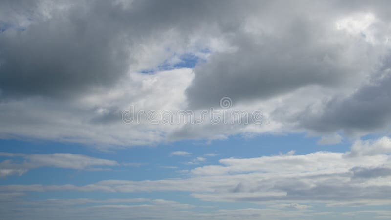 The Sky is a Blend of Light Blue and Gray, with a Multitude of Clouds ...