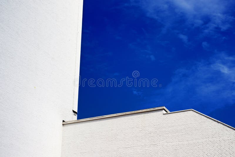 Sky blue white building stock photo. Image of house, brick - 33789302