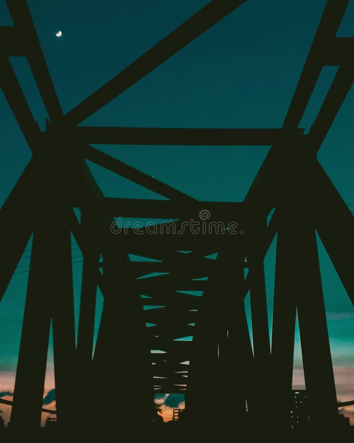 Sky through a bridge stock image. Image of moon, bridge - 123390581