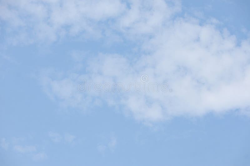 The Sky is Clear and Bright, and the Clouds are Scattered Throughout ...