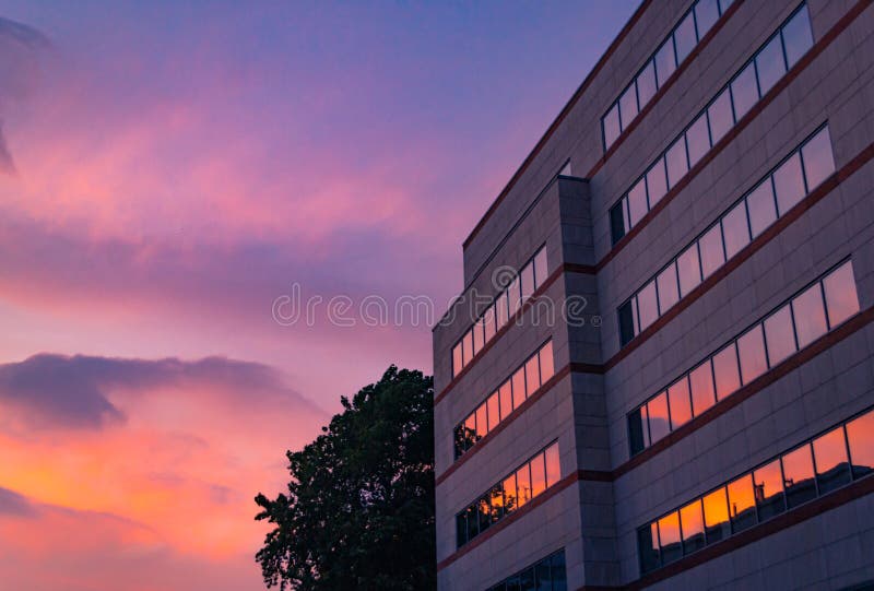 Sky with Clouds Reflected in Windows of Modern Office Building ...