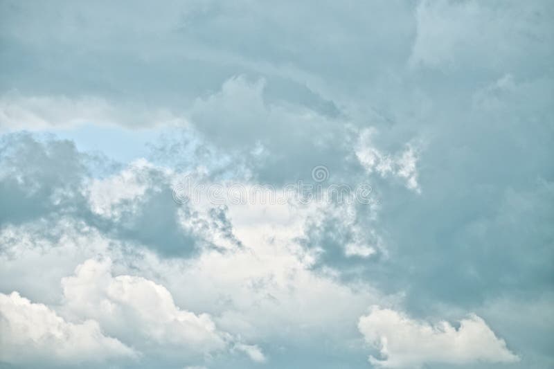 The Sky is Cloudy and the Sun is Not Visible. the Clouds are White and ...