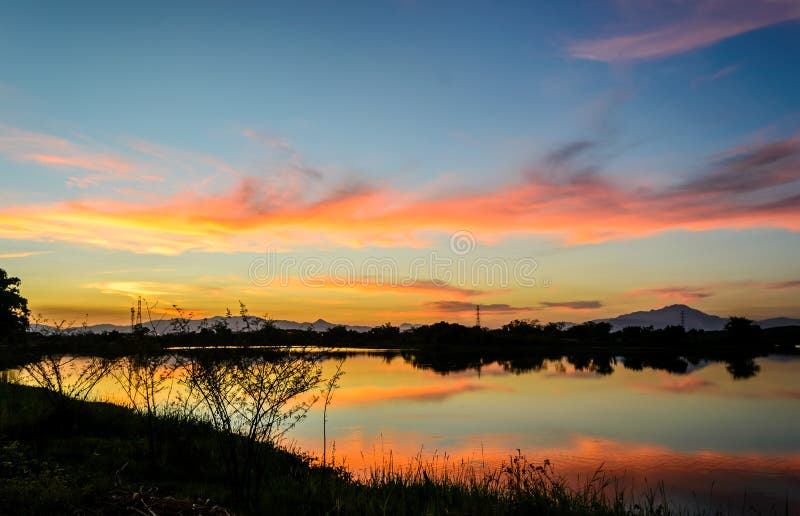 Sky colours at lakeside stock image. Image of wallpaper - 53705623