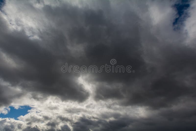 The Sky Covered with Gray, Heavy Clouds. Stock Photo - Image of ...