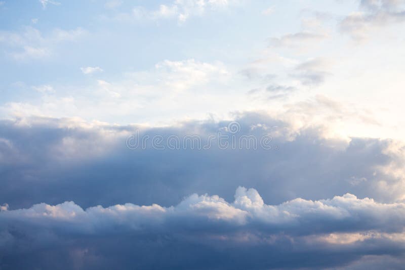 Sky with Dark Storm Clouds Below and Sunlight Above_ Stock Image ...