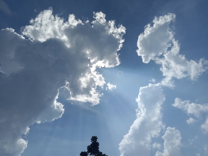 The Sky is Dotted with Clouds Shaped Like Humans Stock Photo - Image of ...