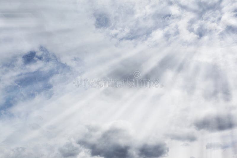 Rays of Light Piercing through Thick Layers of White Cloud Dispersed ...
