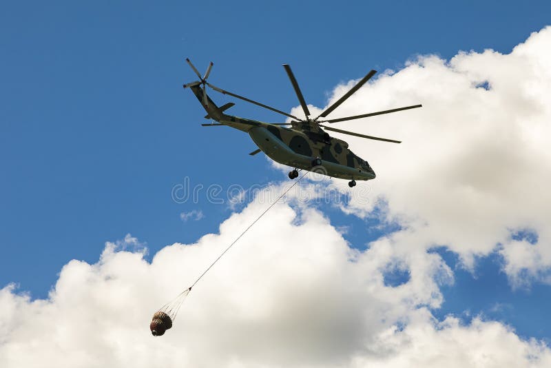 Helicopter is External Load Flying for Cable Cars Construction Stock ...