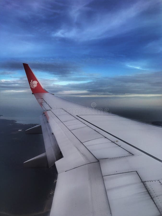Sky and Ground View from Airplane Window Editorial Image - Image of ...