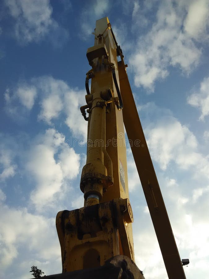 Reach the Blue Sky stock photo. Image of safety, bulldozer - 56630270