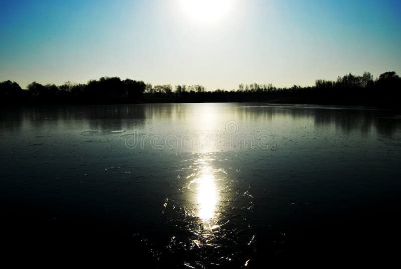 Sky and ice lake shadow stock image. Image of building - 81378685