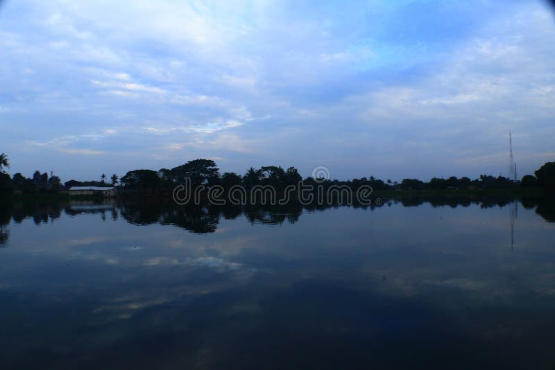 Twilight at Cipondoh Lake, Indonesia Stock Photo - Image of cloud ...