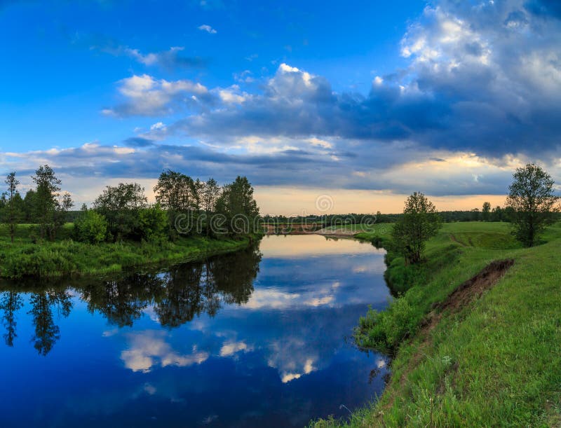 Sky with Light Clouds Reflected in the River Stock Photo - Image of ...