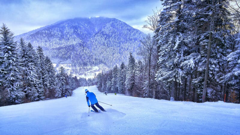 Skying in the raw sun stock photo. Image of snow, sunset - 108481120