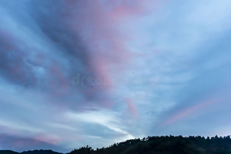 The Sky and the Mountains in the Distance As the Sun Sets Stock Image ...