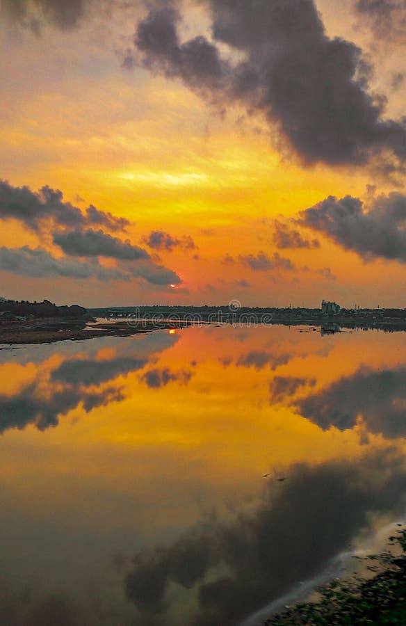 Sky reflection in water stock image. Image of yellow - 154404939